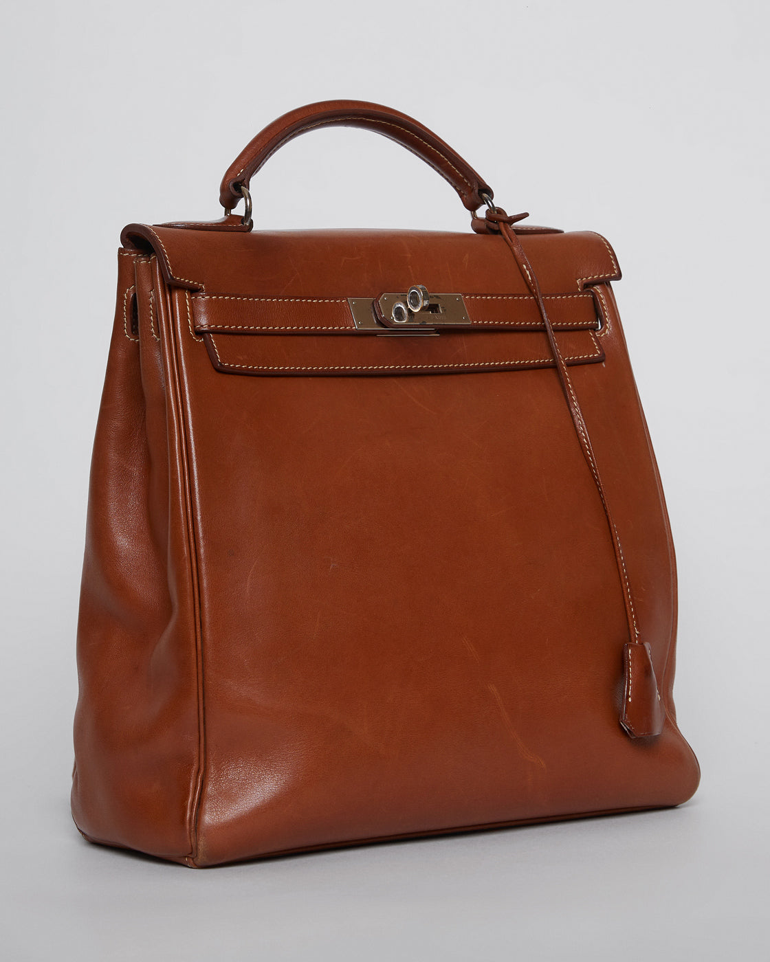 VINTAGE HERMÈS KELLY ADO BACKPACK in saddle brown leather – THE MODAOLOGY